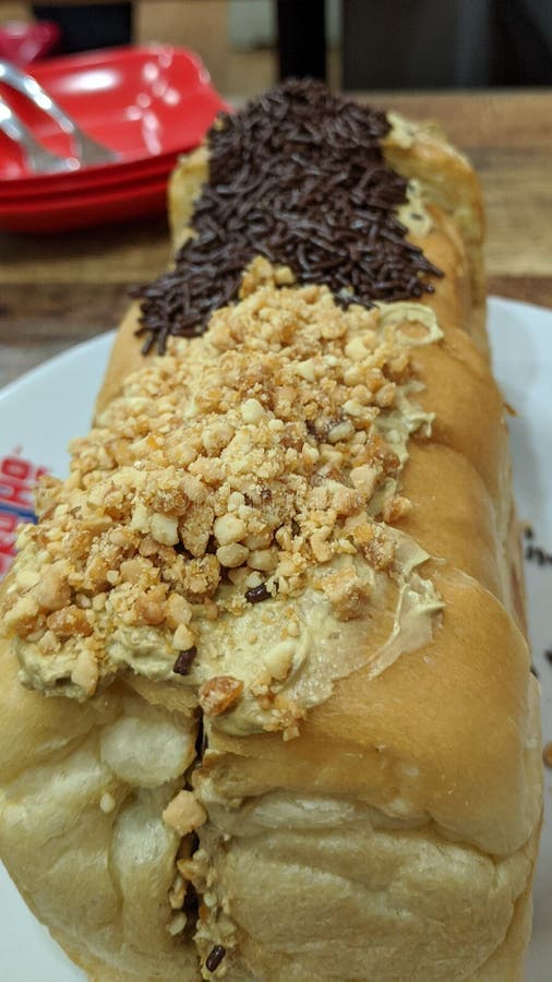 Full Long Bread with Peanut and Chocolate Sprinkles Topping Stock Image ...