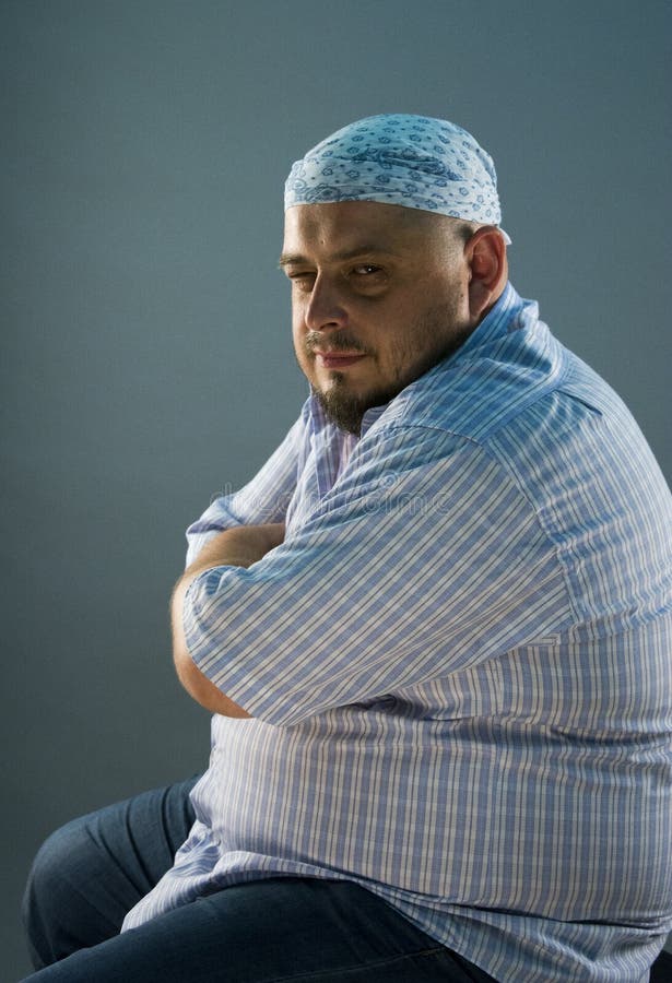 Full male.(wink) stock image. Image of sitting, clothing - 77382745