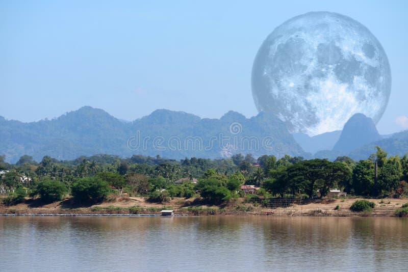 Full Milk Moon Back on Silhouette Mountain and River Stock Image ...