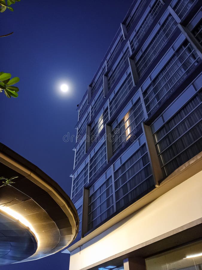 The Full Moon Above the Building at Midnight Stock Photo - Image of ...