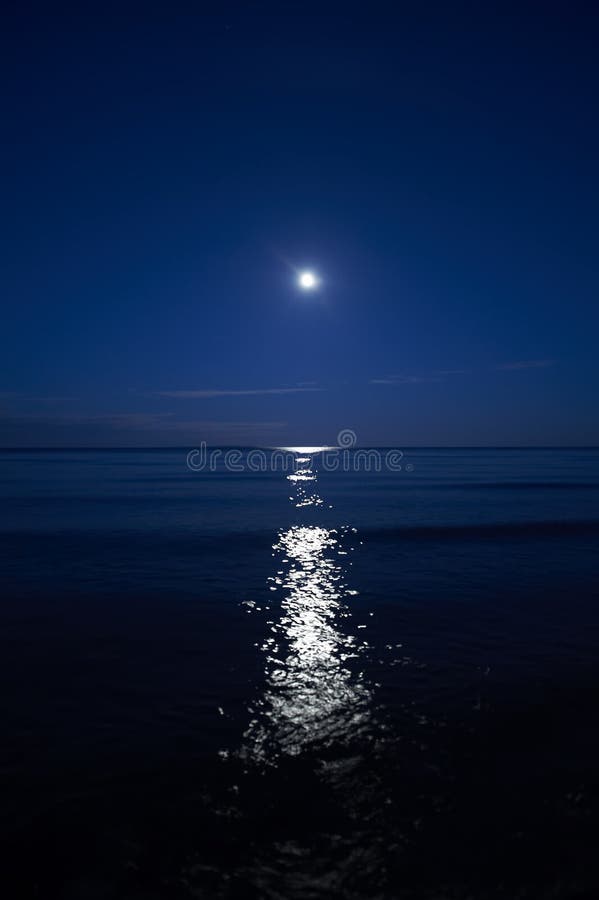 Full Moon Above the Sea at Night Stock Photo - Image of mirror, light ...