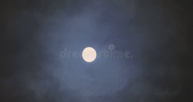 Moonlight Illuminates the Clouds in the Sky. Dramatic Moonlight. Stock ...