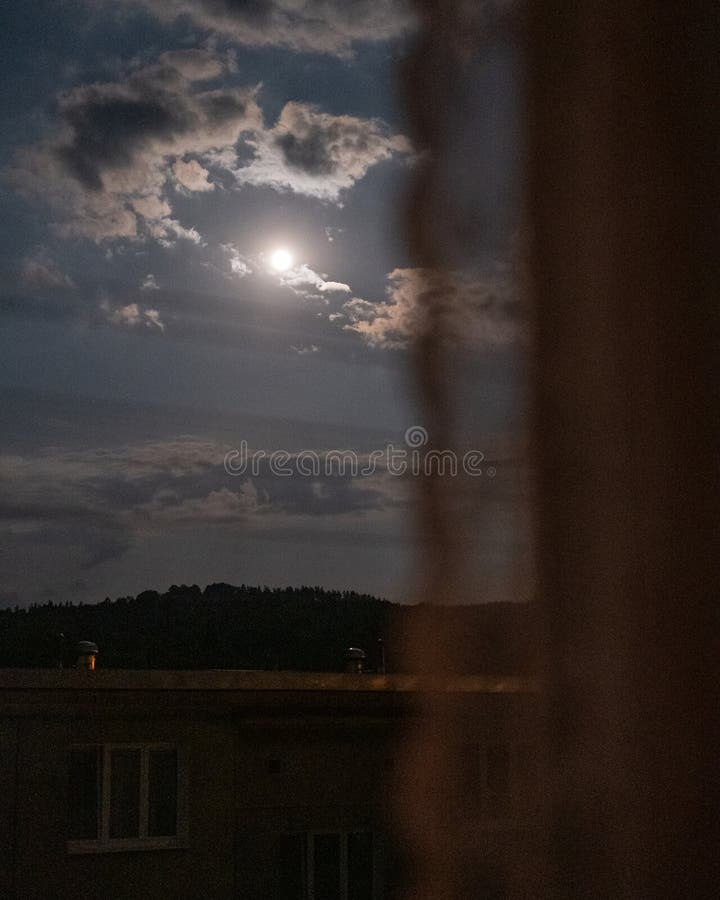 Full Moon Behind Clouds at Night Stock Photo - Image of glow, horizon ...