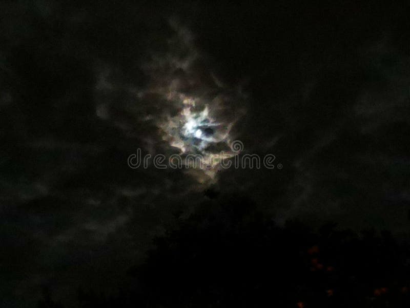 Full moon behind clouds stock photo. Image of moon, full - 140988718