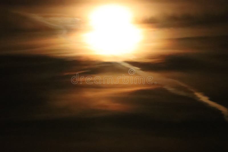 Full Moon Behind a Group of Clouds Over Nebraska Stock Photo - Image of ...
