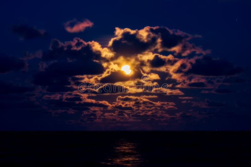 Red Moon in the Blue Sky Night Stock Photo - Image of light, cloud ...