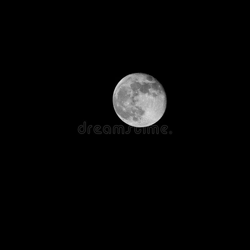 Full moon on a dark night stock image. Image of detail - 261073745