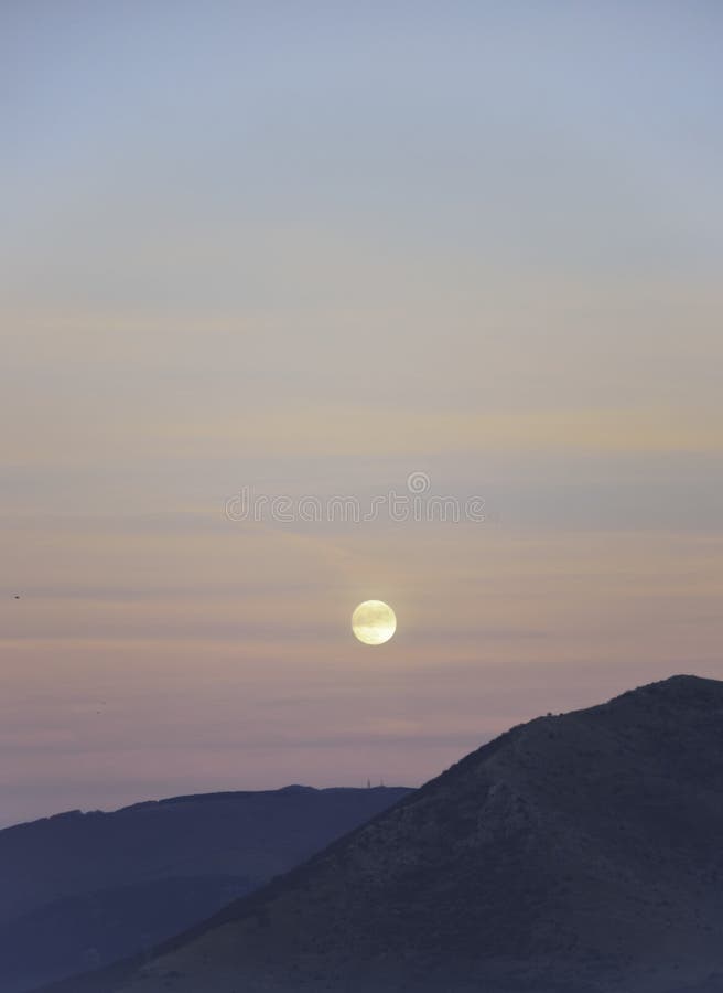 Full moon at dusk stock image. Image of cover, rising - 65792413