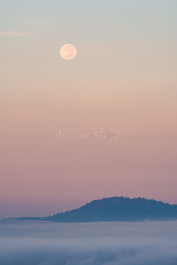 Full Moon Falling and the Mist in the Morning Time. the Color Orange ...