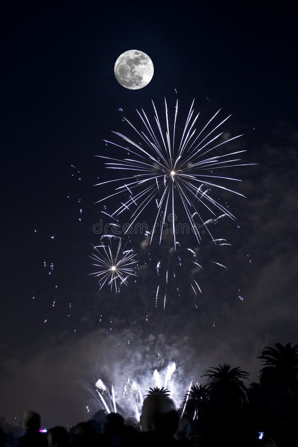 Fireworks and full moon stock photo. Image of night, smoke - 39219378