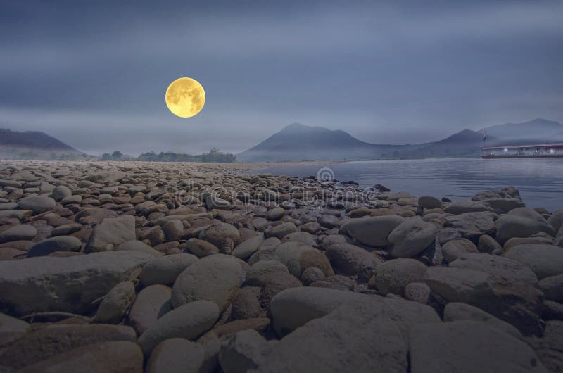 Full Moon in the Fog Over Stone Beach Stock Photo - Image of landscape ...