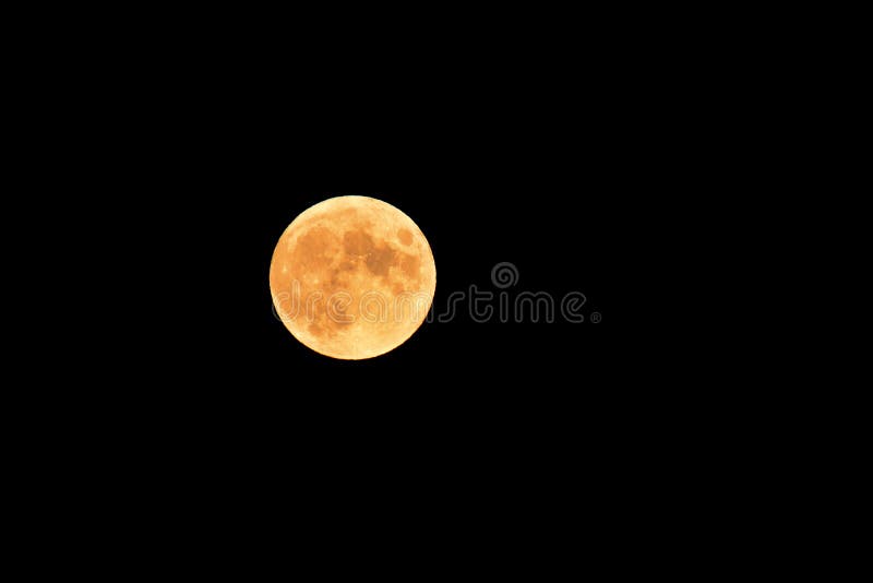 A Full Hunters Moon, an Orange-colored Moon Obscured by a Layer of Dark ...