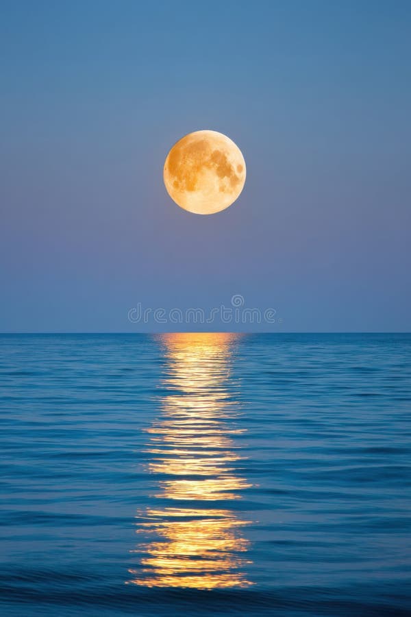 Full Moon Illuminating Calm Ocean Waters at Twilight, Casting a ...