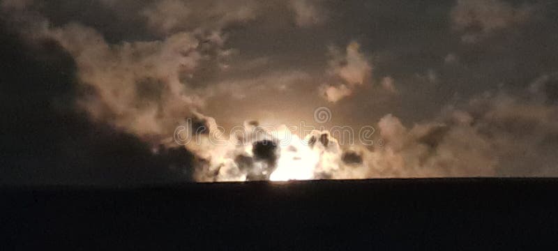 Full Moon Light when the Moon is about To Emerge from Under the Clouds ...