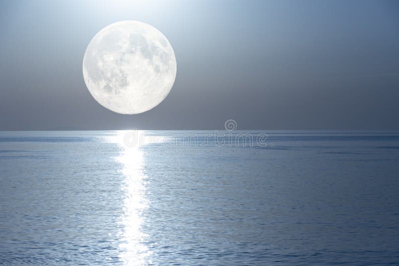Full Moon with a Lunar Path Reflected in the Mirror of the Sea Stock ...