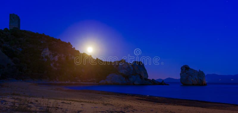 Full moon over the beach stock image. Image of rocks - 28070051