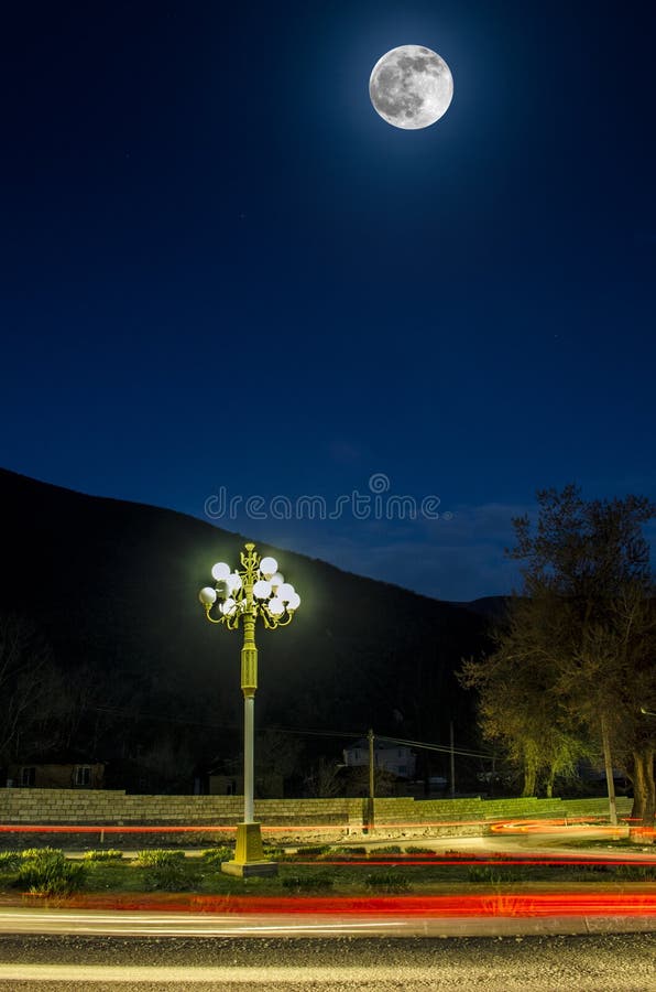 Full Moon Over an Empty Highway Crossing at Night. Stock Photo - Image ...