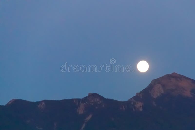 Full moon over mountain stock photo. Image of full, lunar - 167975544