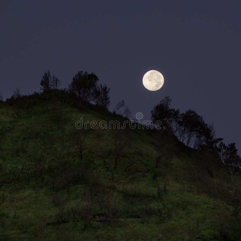 Full moon over mountain stock photo. Image of surface - 62352702
