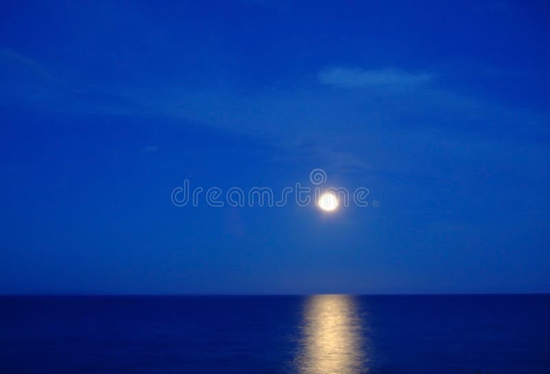 Full moon over the ocean stock photo. Image of dusk, blue - 5859606