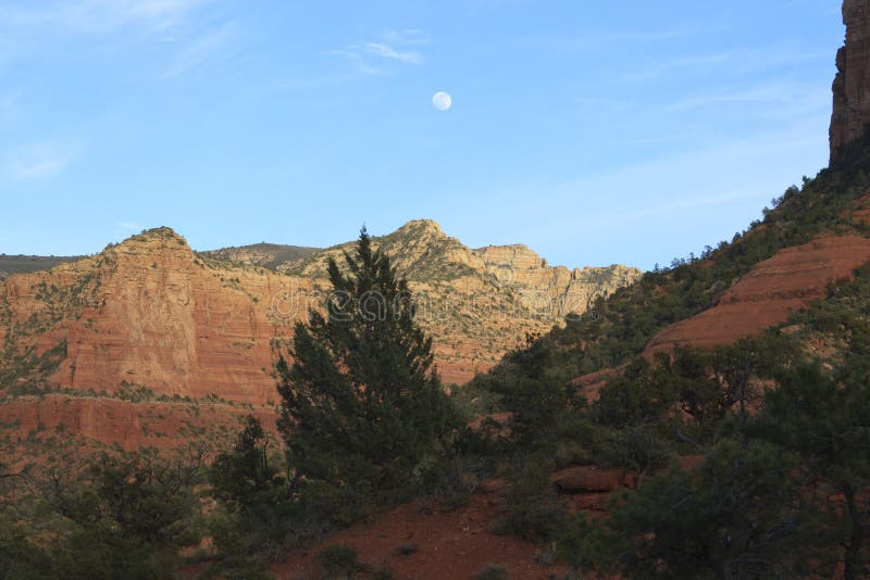 Full moon over red rocks stock photo. Image of moon, rising - 23328100