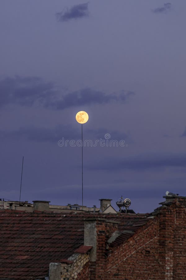 The Full Moon Over the Rooftop the Moon is Aligned with a Lightning Rod ...