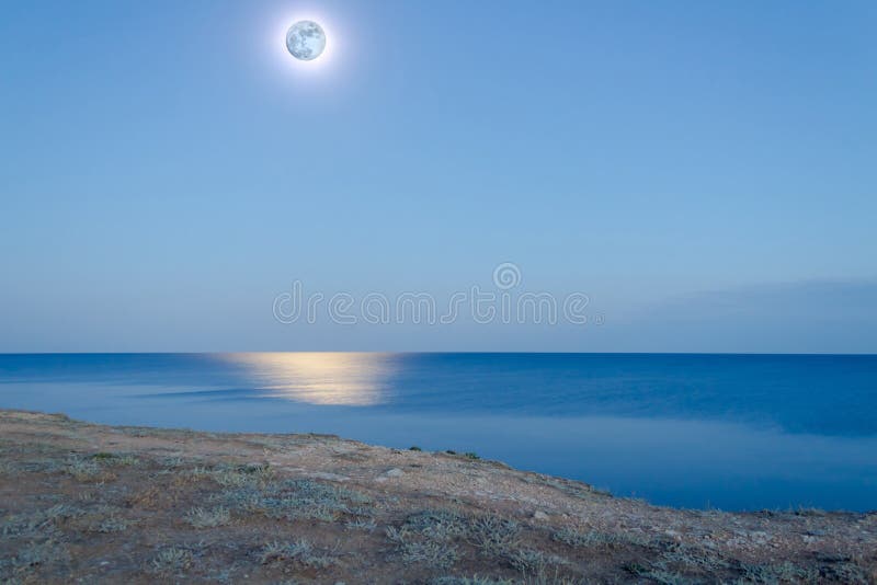 Full moon over the sea stock photo. Image of astrology - 194734570