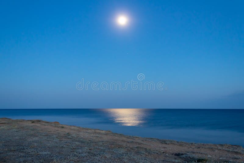 Full moon over the sea stock photo. Image of dark, beam - 197688014