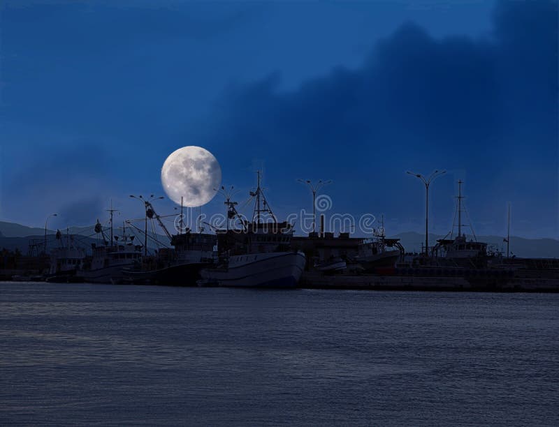 Full Moon Over the Silhouette of Boats at the Port Stock Photo - Image ...