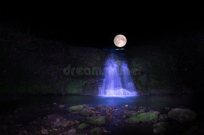 Full moon over water fall stock image. Image of dark - 132543931
