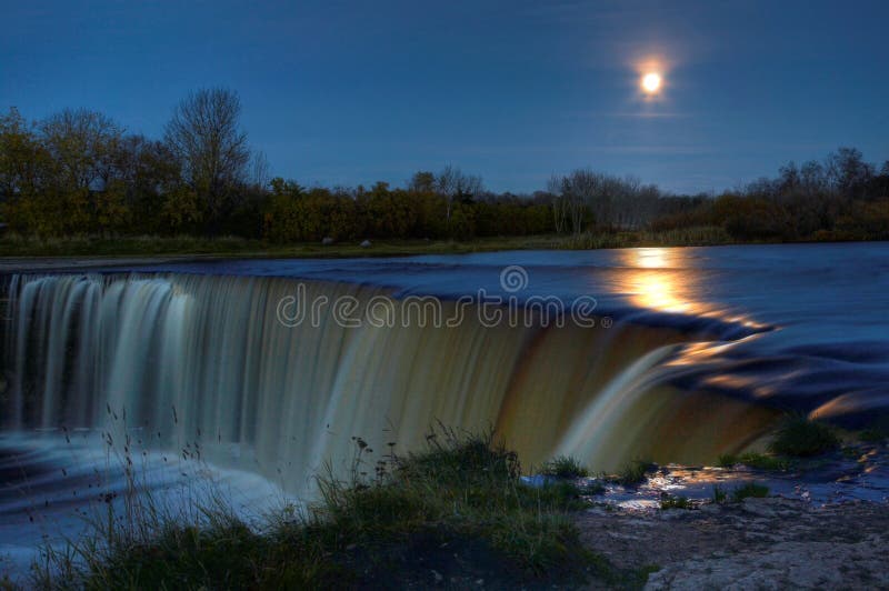 Full Moon Over Waterfall stock image. Image of midnight - 6790773