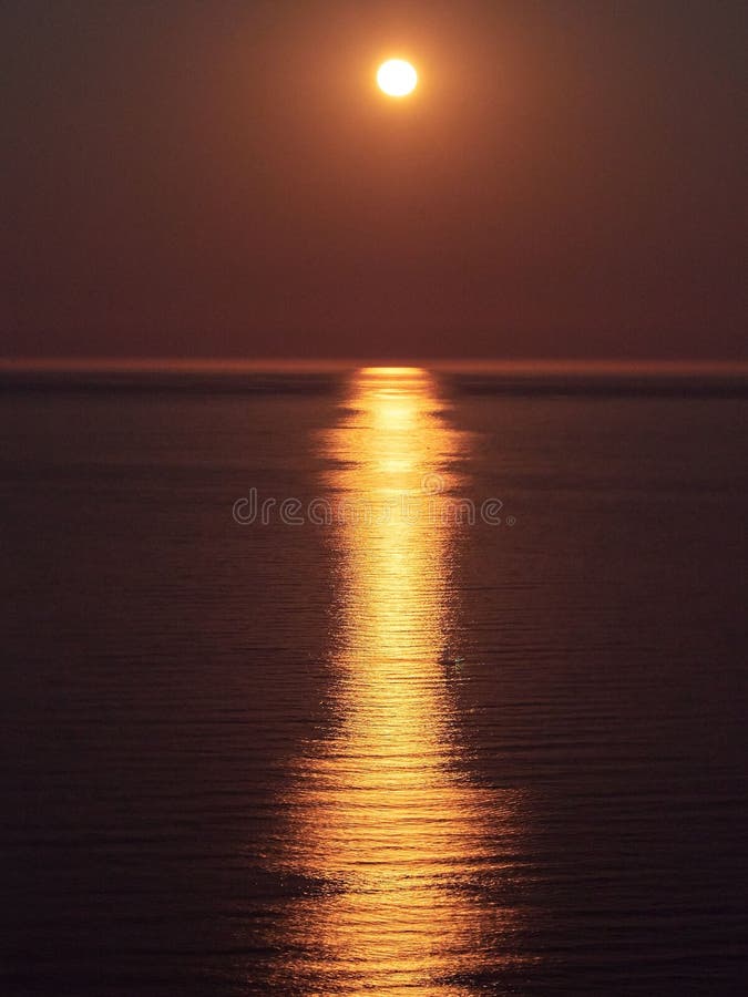 Full Moon Reflecting in the Calm Sea at Night Time Stock Photo - Image ...
