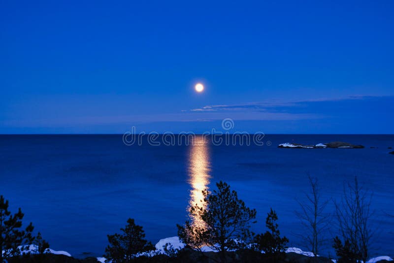 Full Moon and the Reflection in the Sea Stock Photo - Image of light ...