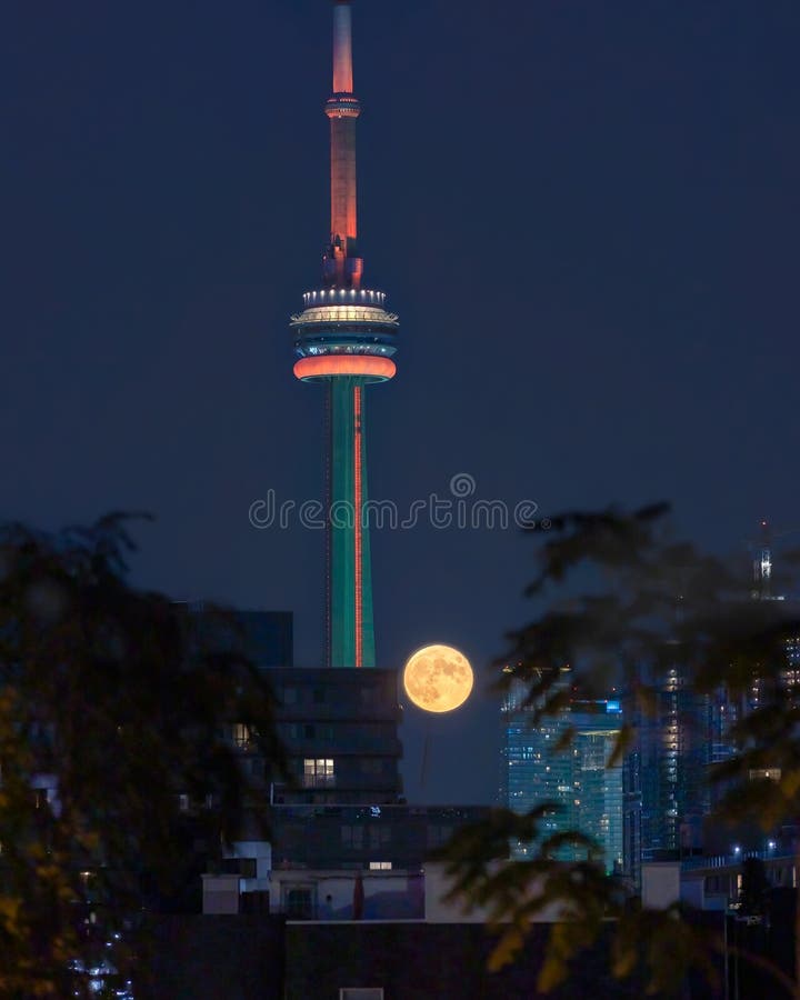 Full Moon Rising Behind the Toronto Skyline and CN Tower Stock Photo ...