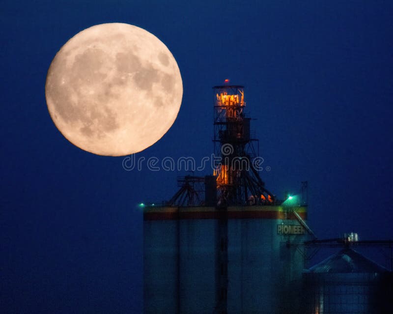 Full Moon Rising Over Grain Elevator at Twilight Stock Image - Image of ...