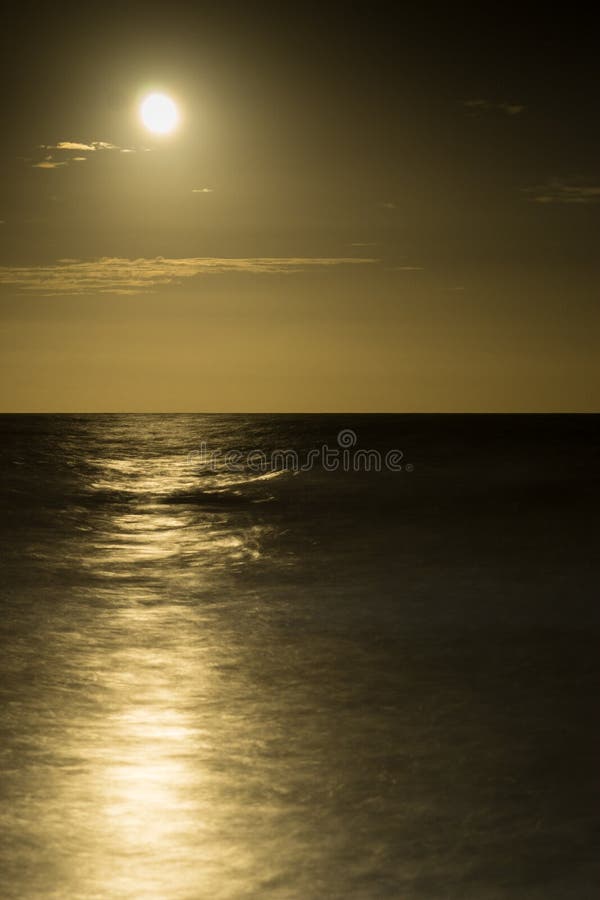 Full Moon Rising Over the Ocean Stock Image - Image of golden, cloudy ...