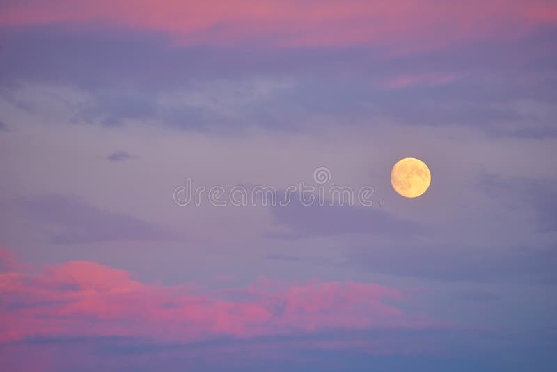 Full Moon Rising during Spring Evening with Blue Sky Stock Image ...