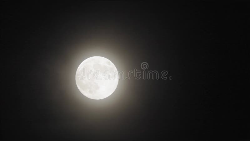 Full Moon Rising with Thin Clouds Creating a Glow Stock Footage - Video of dark, motion: 352379458