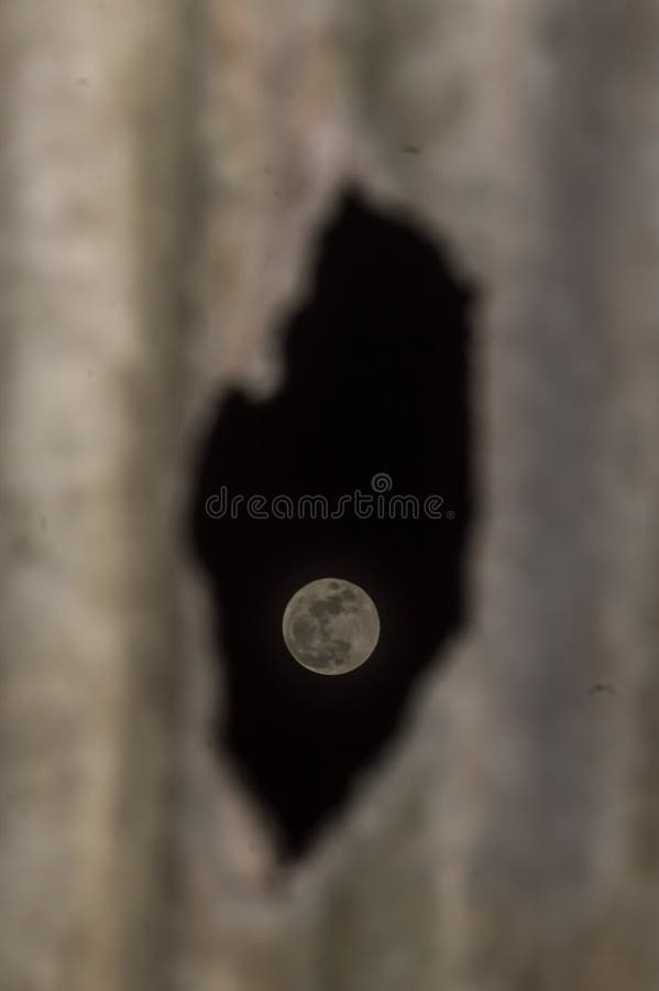 Moon Seen through Rock Formation Stock Image - Image of desert, western ...