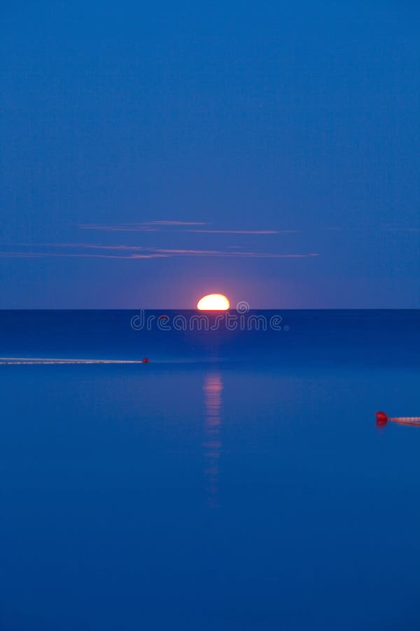 Moon Setting Behind Mountain Peek Stock Image - Image of redrock ...
