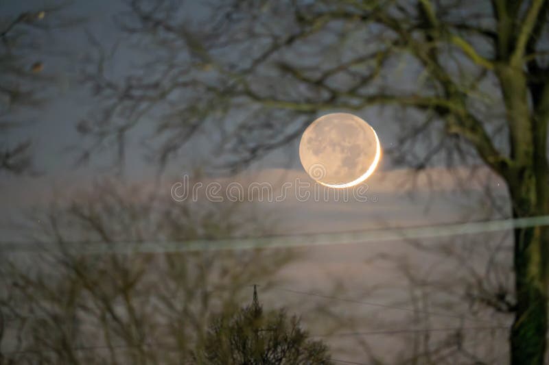 A Full Moon is Shining Brightly in the Sky Stock Photo - Image of ...