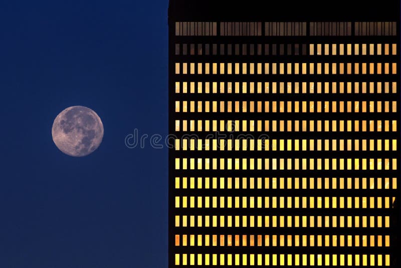 Full Moon and Skyscraper stock image. Image of evening - 251665139