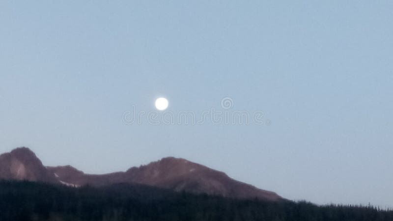 Full Moon Soon To Share the Sky with the Morning Sun Stock Photo ...