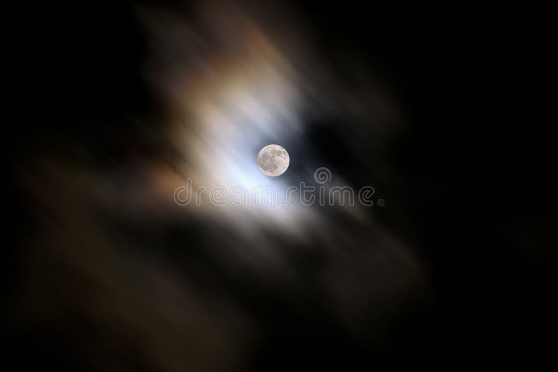 Full Moon or Super Moon Phase with Light Shining in the Clouds Stock ...