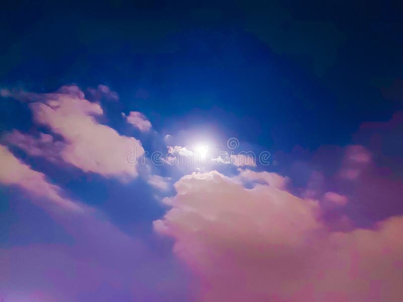 Full Moon Surrounded with Clouds Coloured with Stunning Colours Stock ...