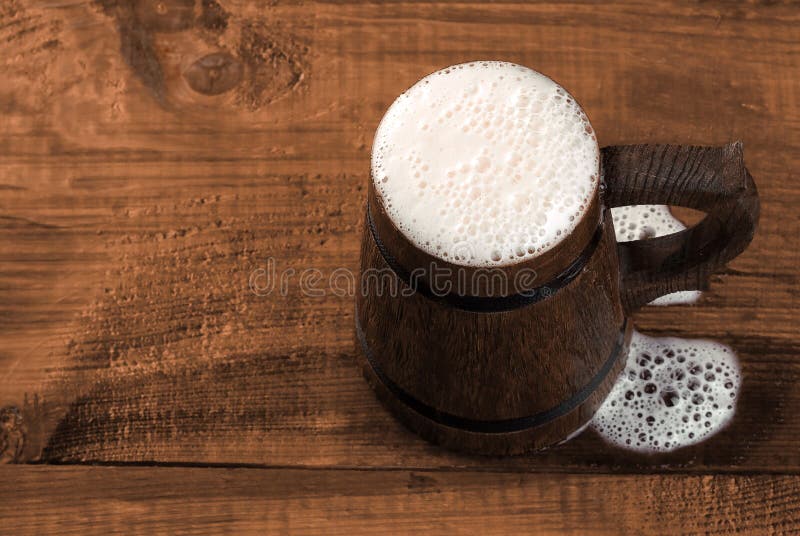 Full Mug of Fresh Beer on a Wooden Table. Stock Photo - Image of ...
