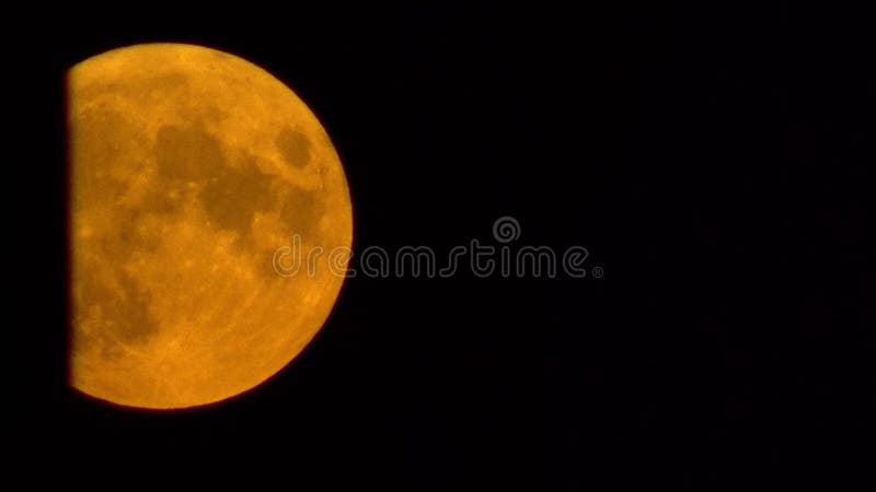Orange Moon Passing Clounds at Night.Full Moon at Night with Cloud Real ...