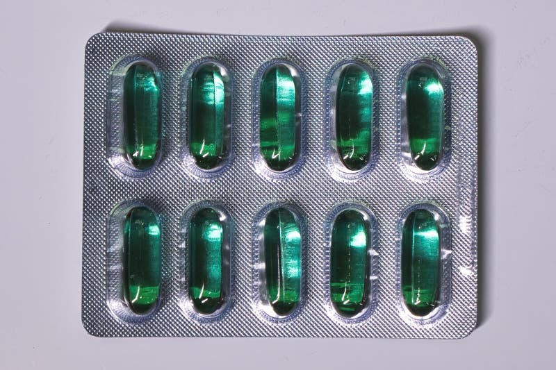 Full Pack of Green Capsules Stock Photo - Image of supplements, herbal ...