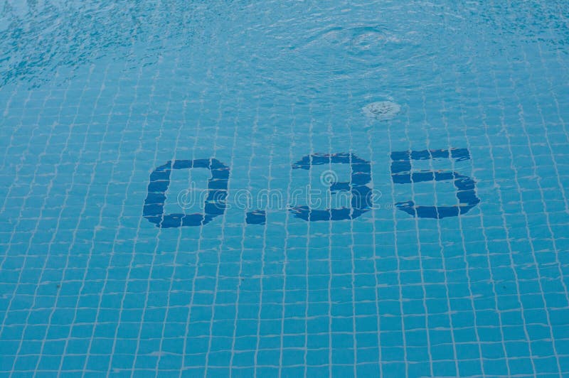 A Full Pool with a Depth Symbol on the Tile Below the Surface of the ...