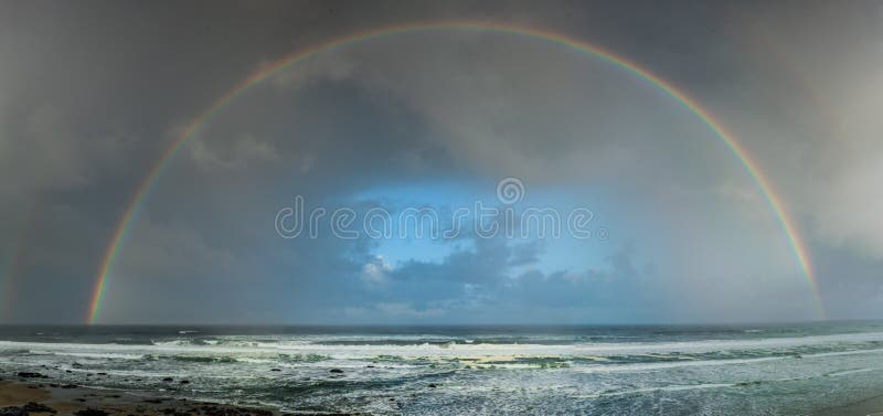 Full Rainbow Arch Above the Pacific Ocean on the Oregon Coast Stock ...